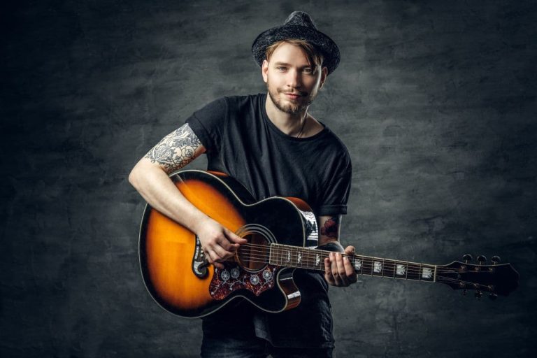 The Complete Guide to Holding a Guitar While Standing