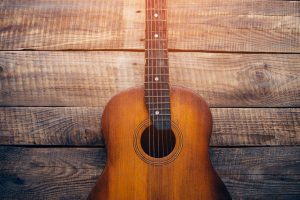 Why Does Your Acoustic Guitar Sound Tinny? 10 Fixes